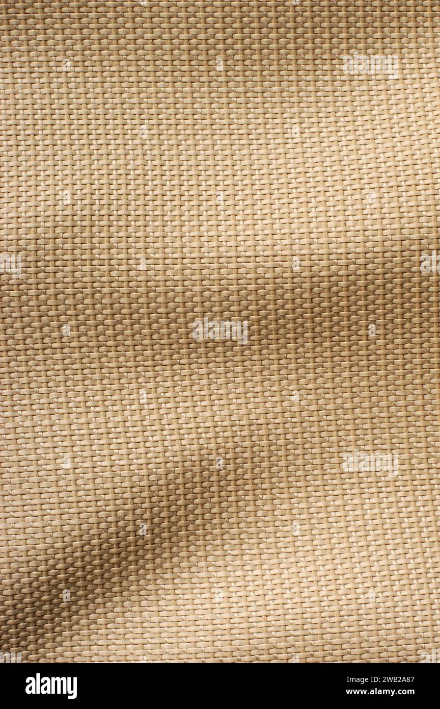 A vertical of a brown woven wavy fabric background Stock Photo - Alamy