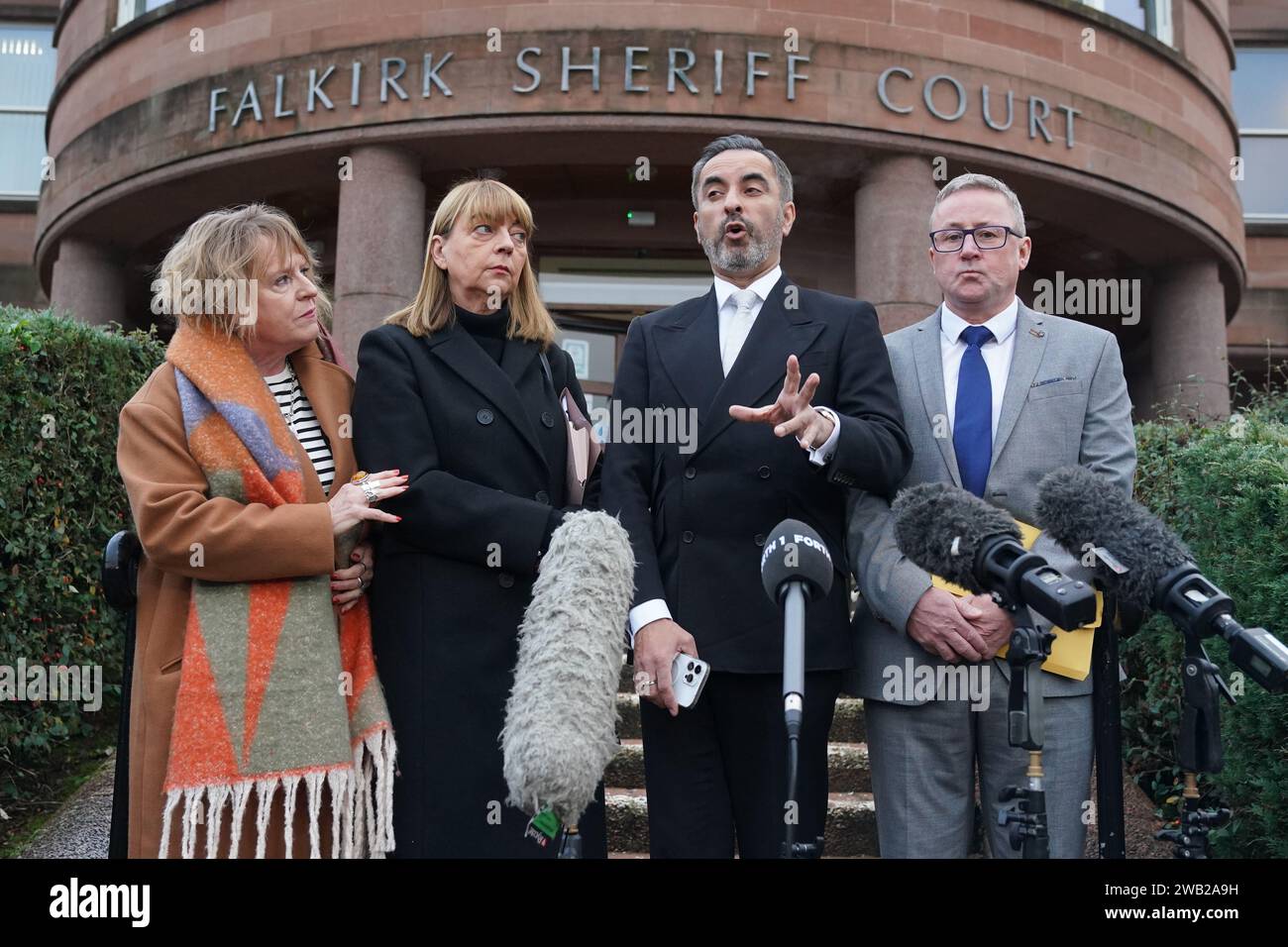 Solicitor Aamer Anwar (2nd right) representing the families of both ...