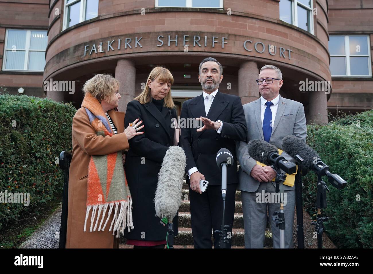 Solicitor Aamer Anwar (2nd right) representing the families of both ...