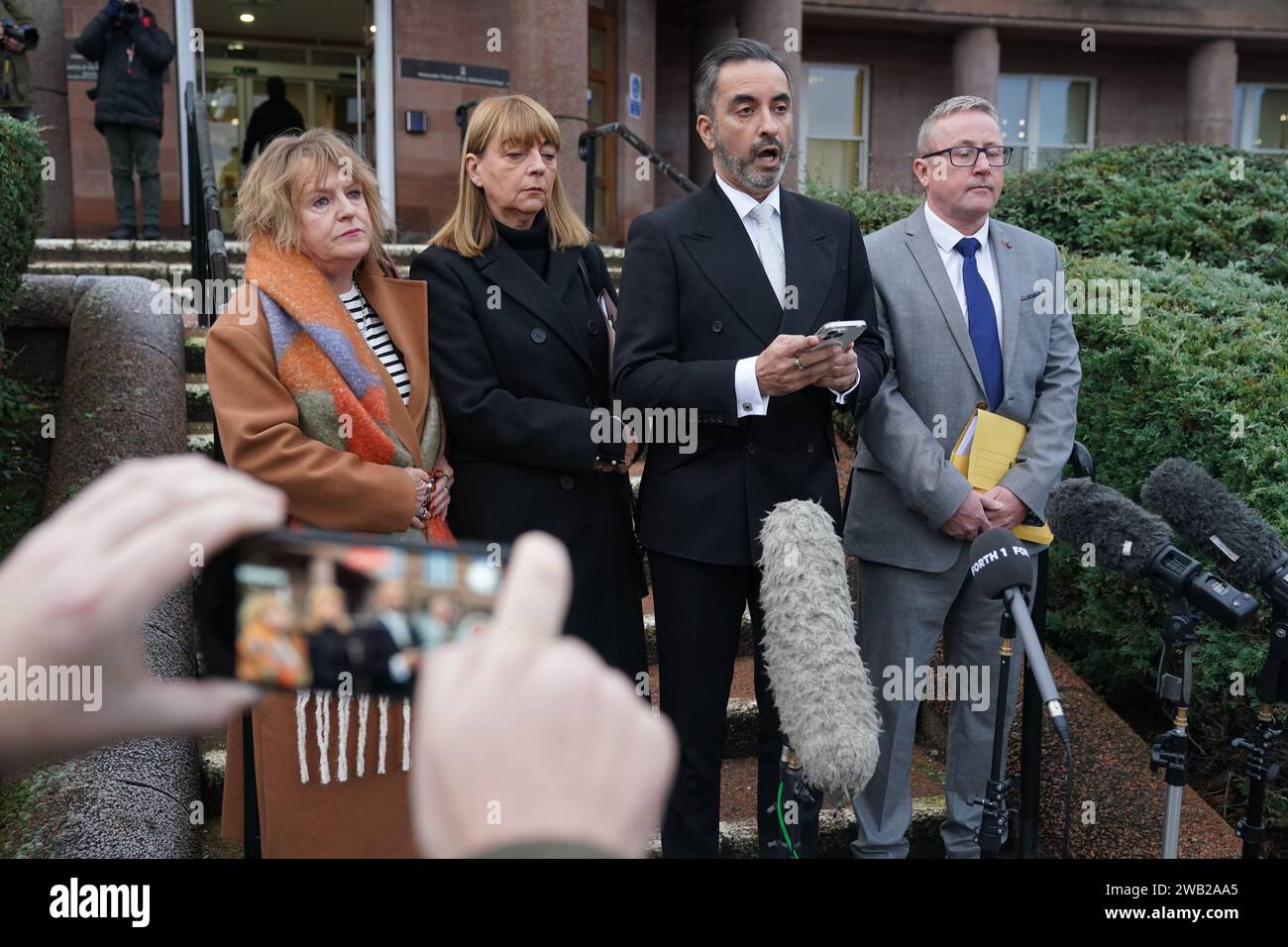 Solicitor Aamer Anwar (2nd right) representing the families of both ...