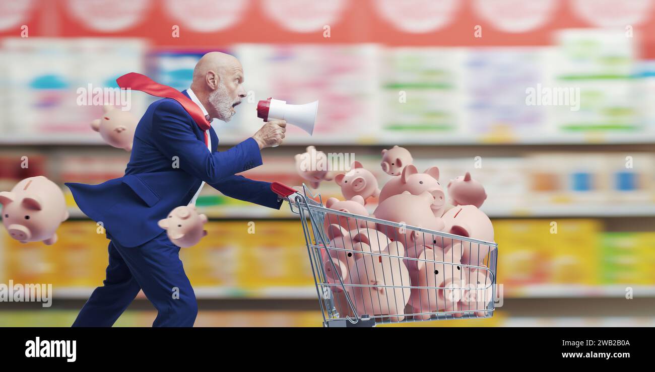 Fast businessman shouting into a megaphone and pushing a shopping cart ...