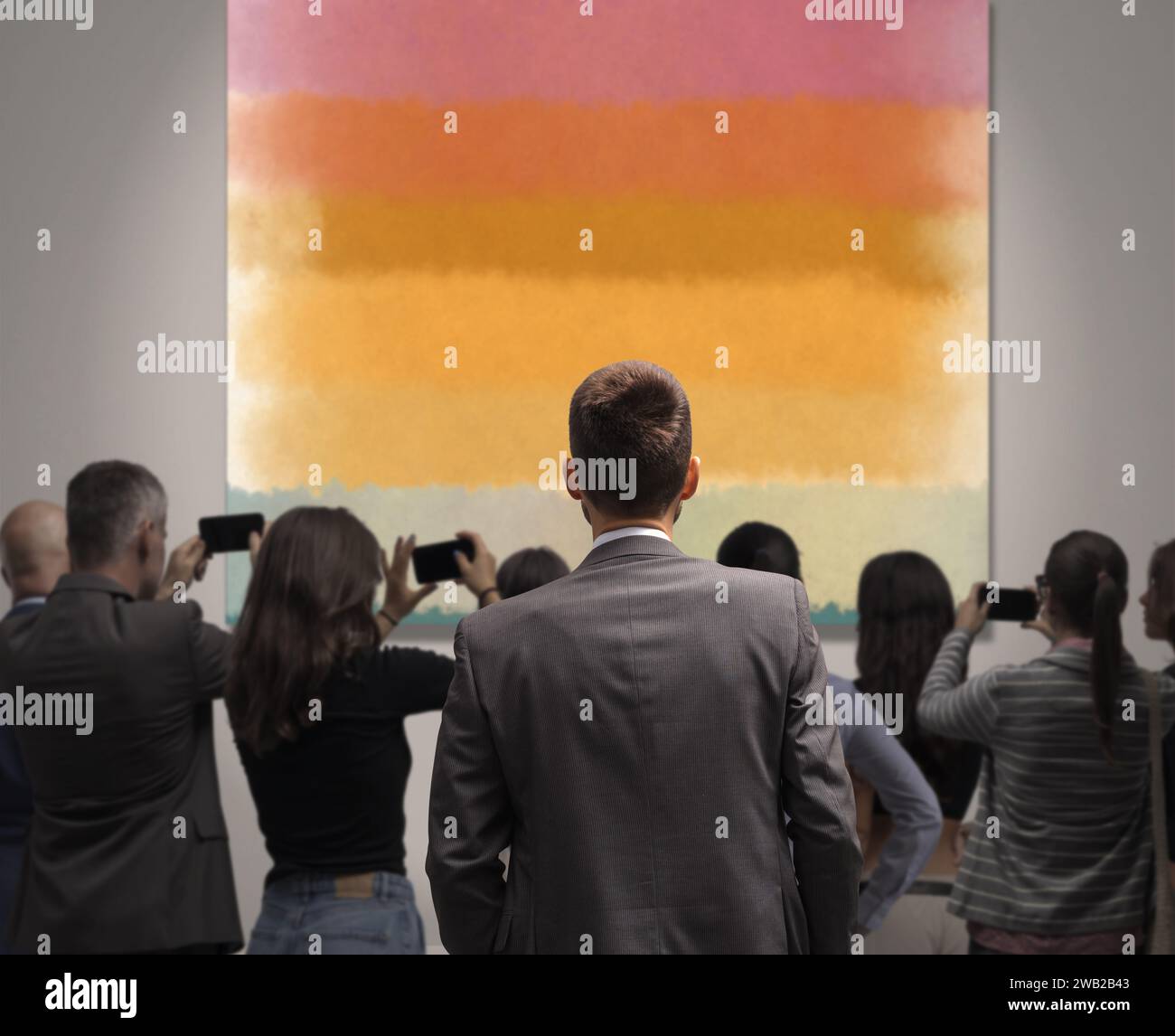 People in the art gallery looking at paintings, abstract contemporary ...