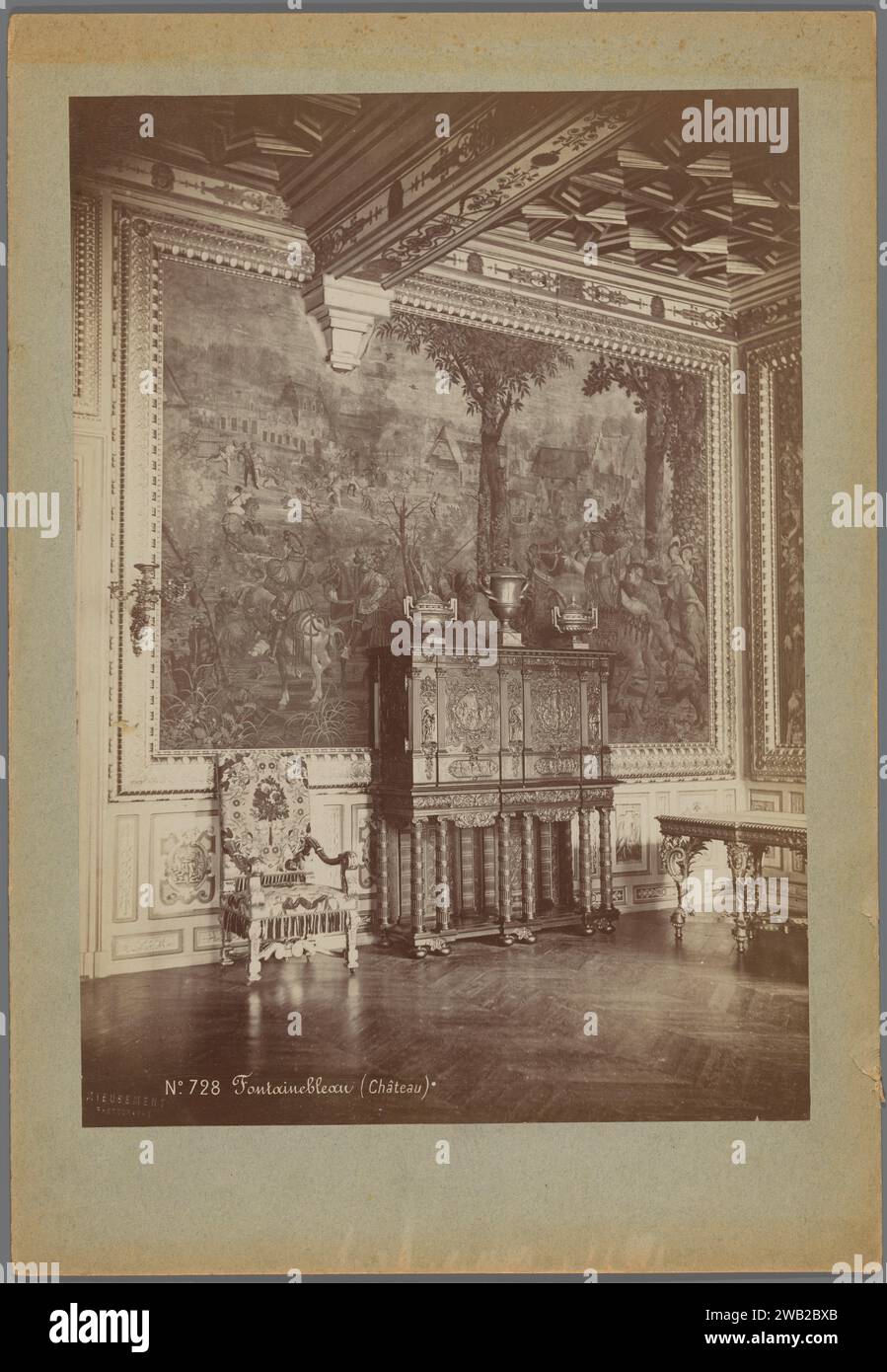 Interior of the Fontainebleau palace with a wall cupboard and a chair ...