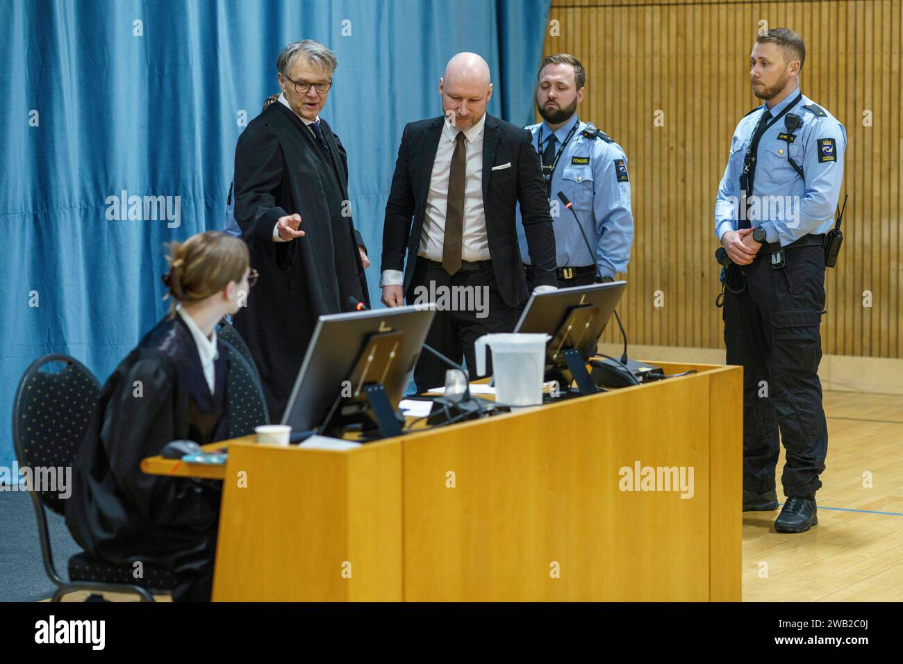 Anders Behring Breivik, center, arrives as the Oslo district court ...