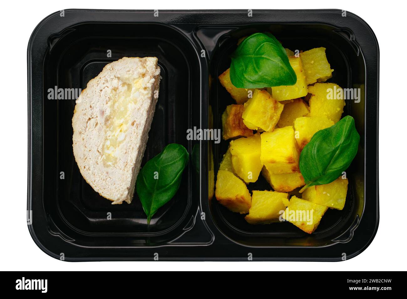 boiled potatoes with chicken in lunch box on white background Stock ...