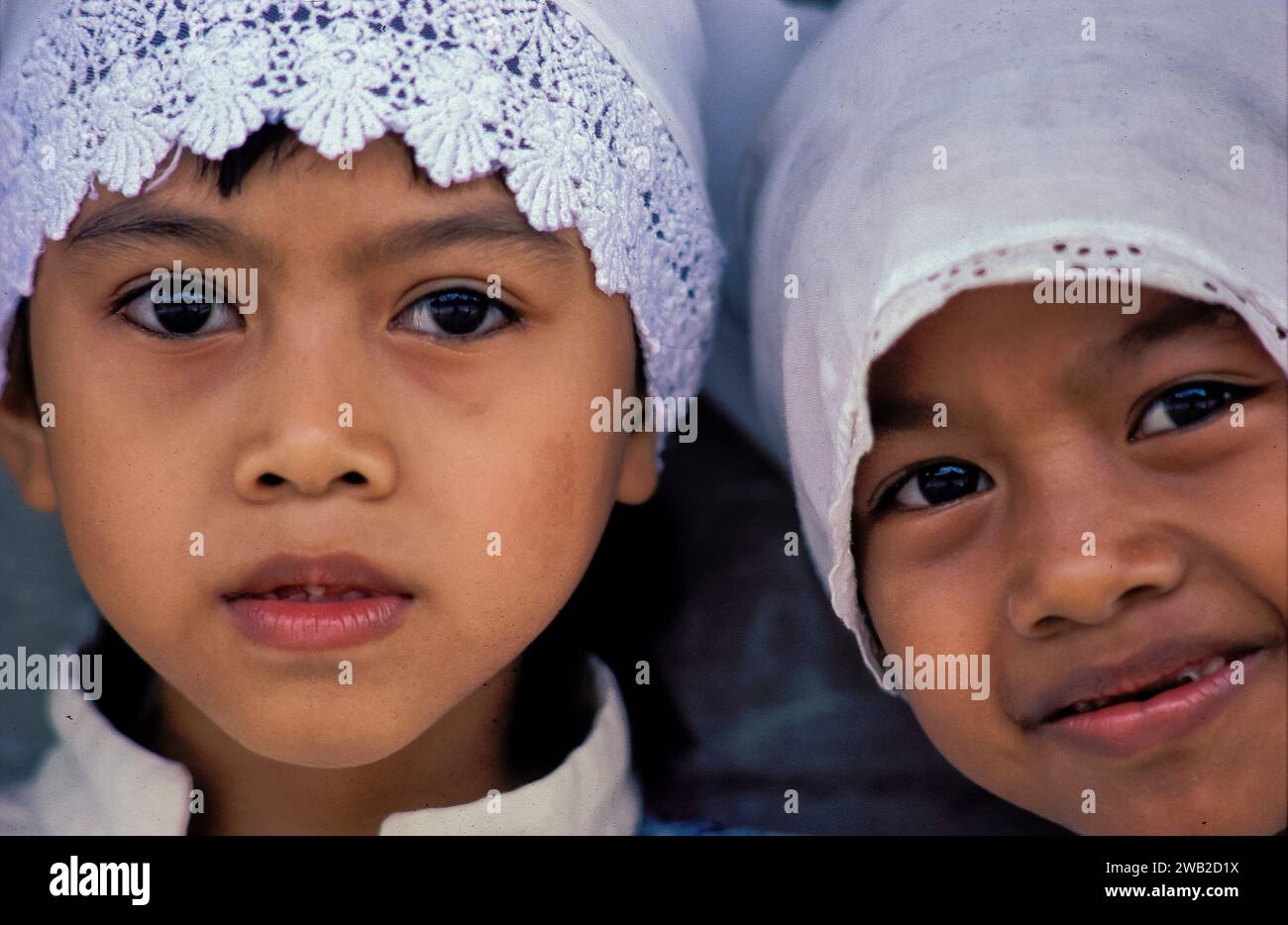 Indonesia, Sulawesi - Portrait of two veiled girls Stock Photo - Alamy