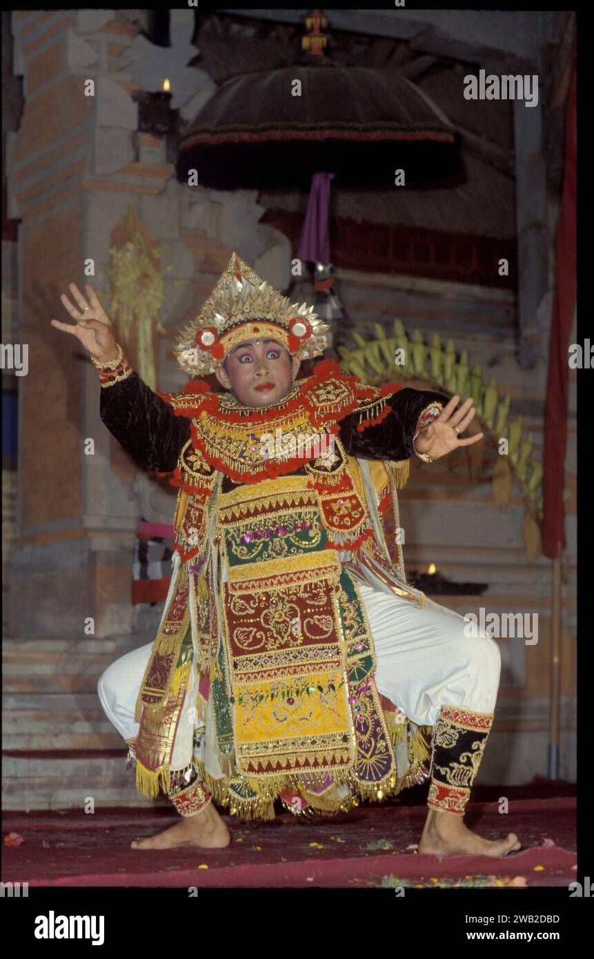 Indonesia, Bali. Temple dancer dancing, wearing traditional clothing ...