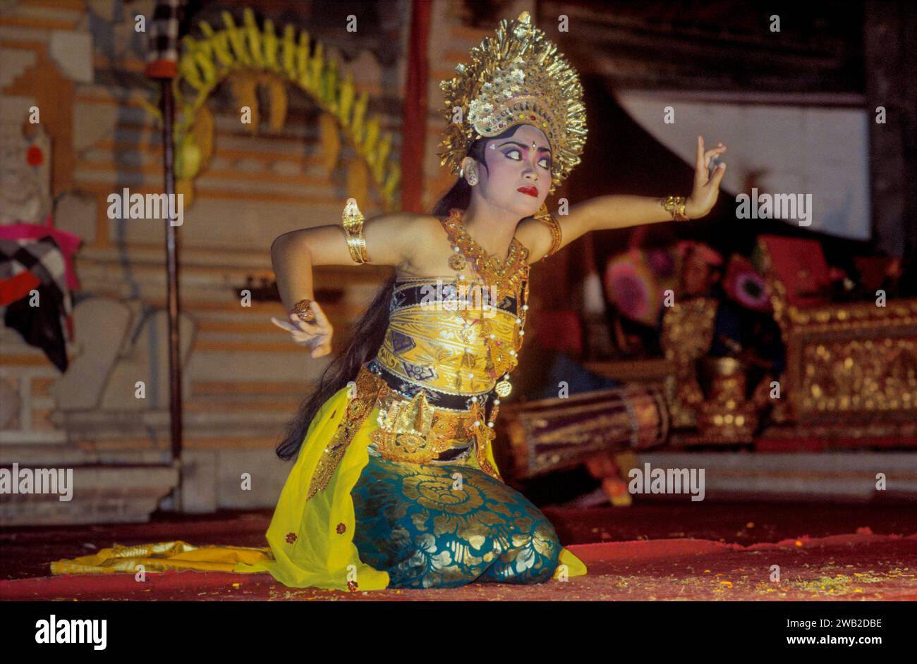 Indonesia, Bali. Temple dancer dancing, wearing traditional clothing ...