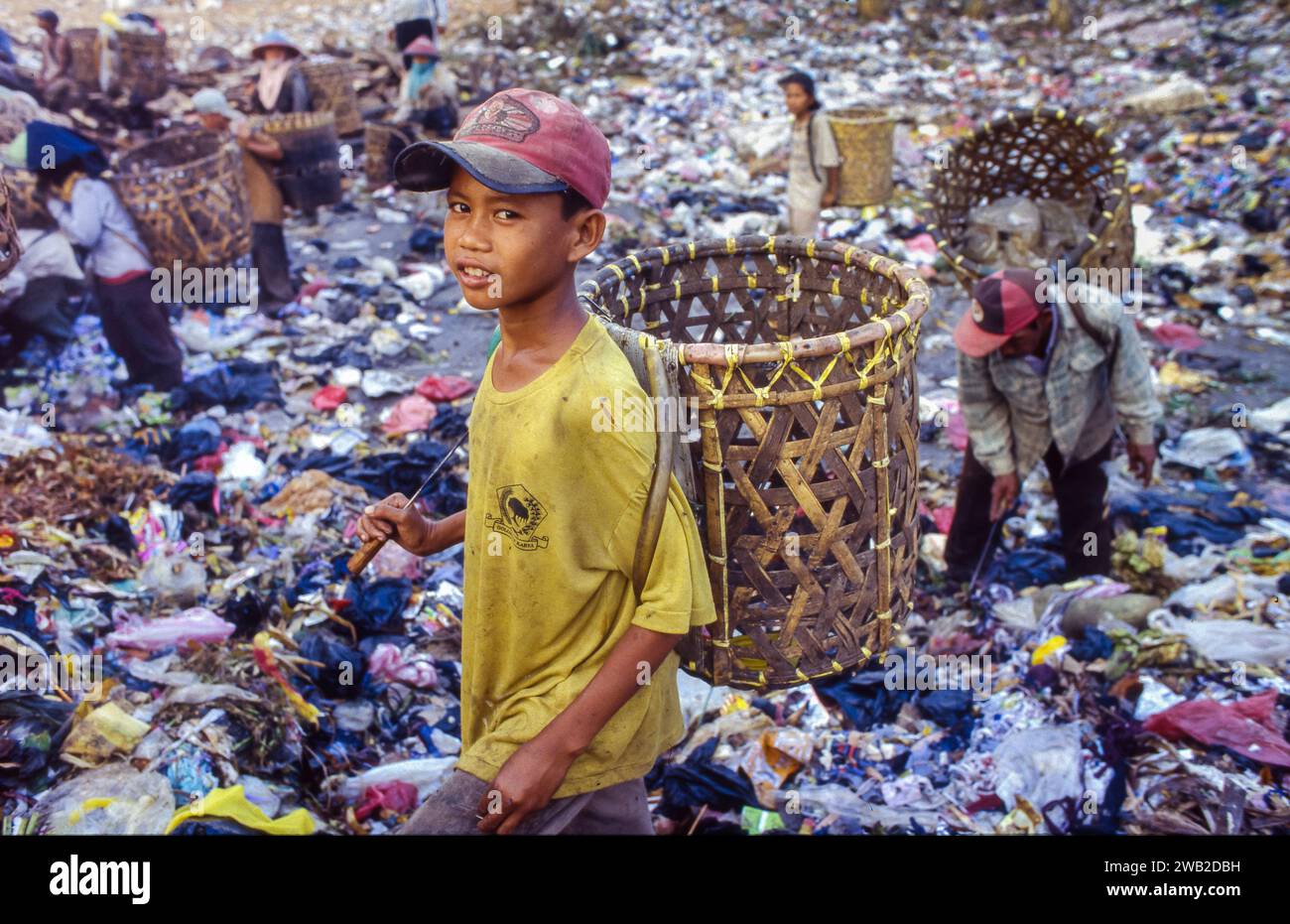 Indonesia, Jakarta. Boy picking garbage at Bantar Gebang, the garbage ...
