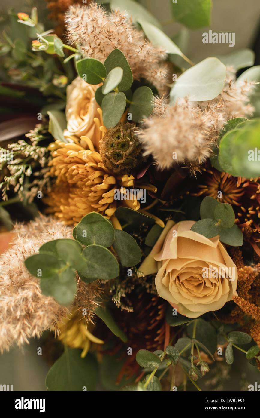 Autumn inspired floral arrangement with eucalyptus leaves Stock Photo ...