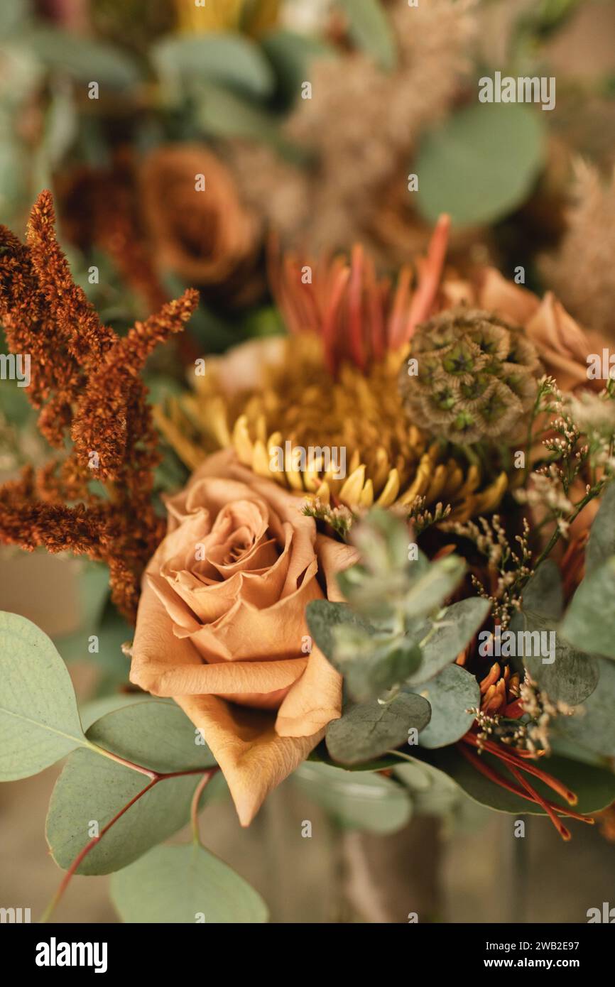 Close up of dried rose in a fall-inspired floral arrangement Stock ...