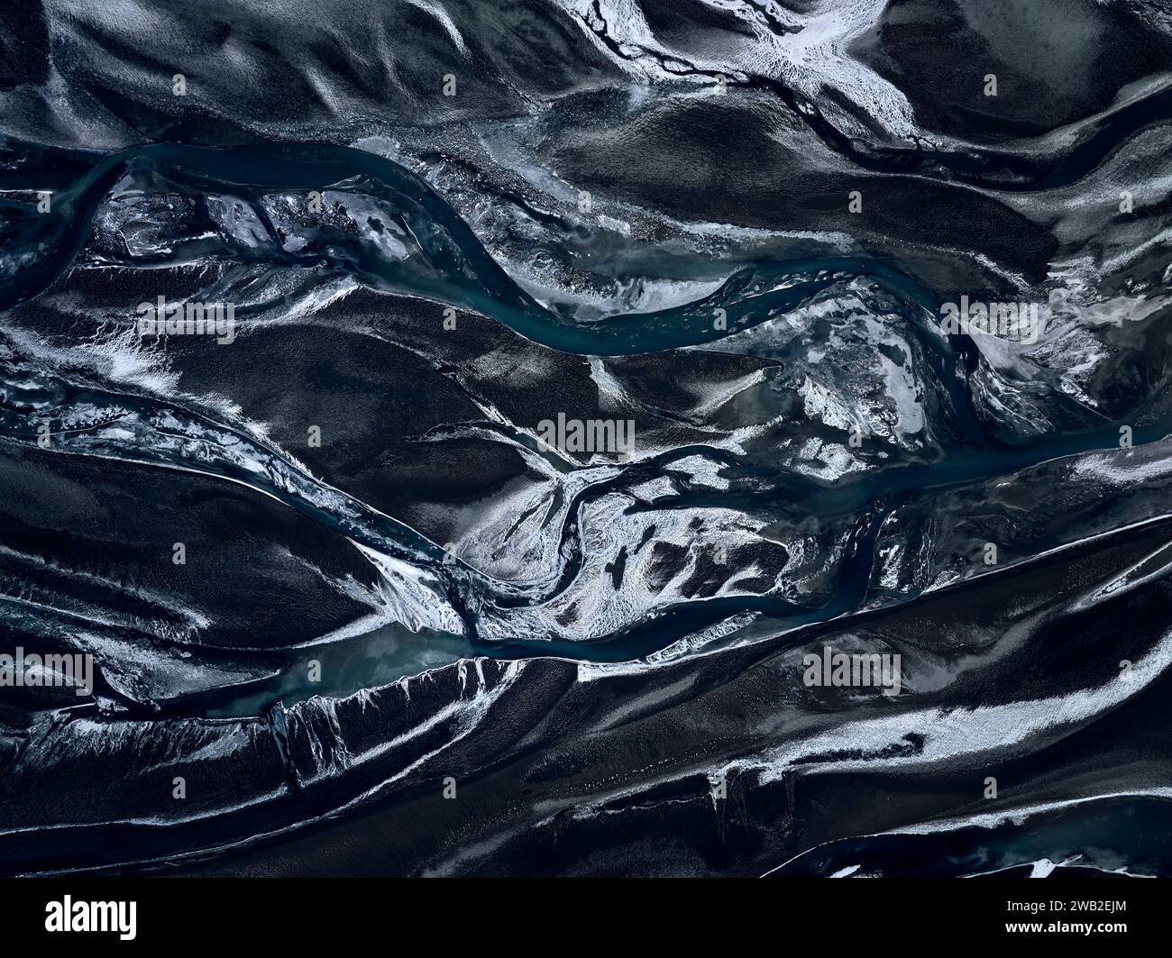 Amazing view of glacier rivers with wavy surface Stock Photo - Alamy