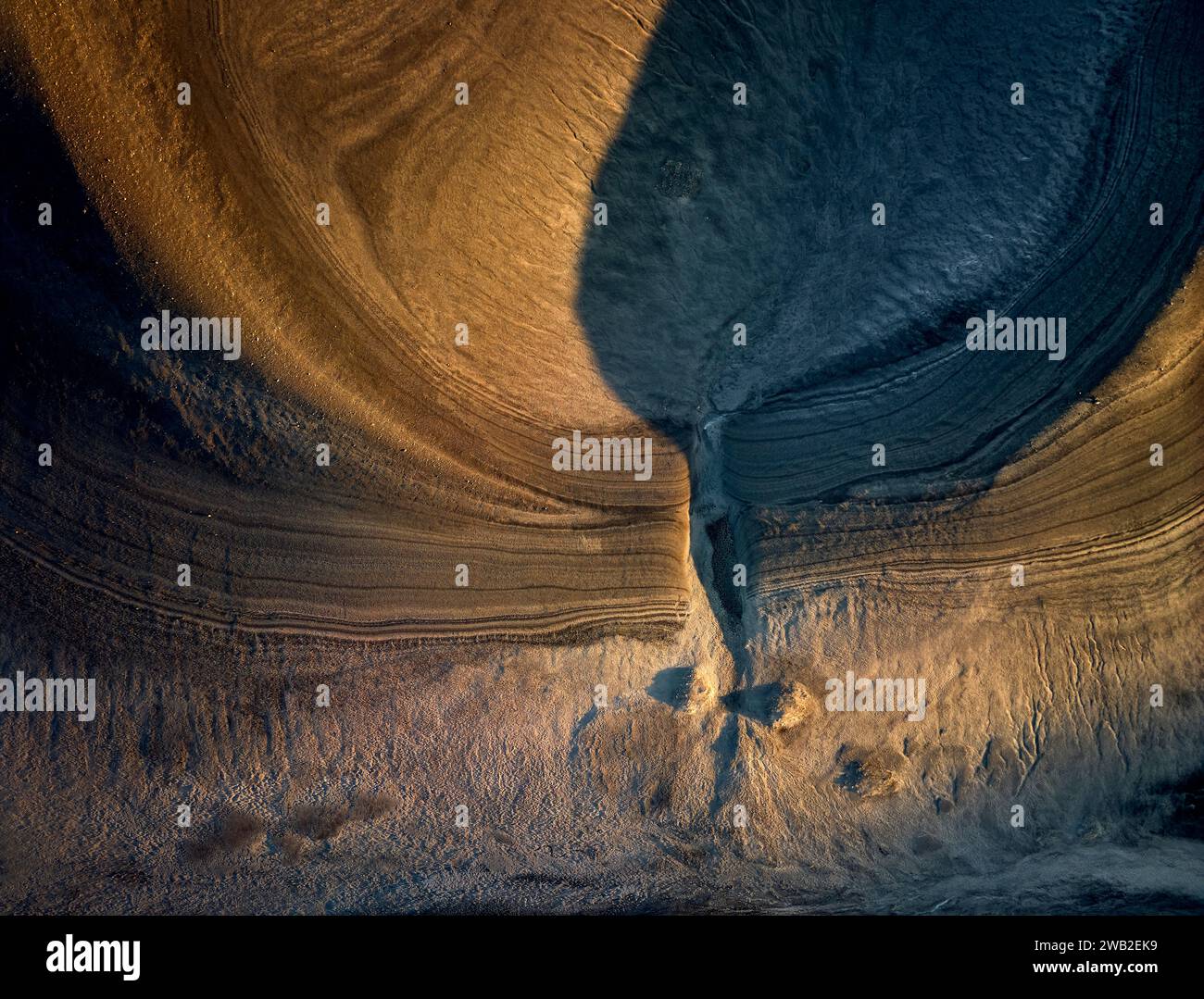 Amazing view of rocky formations with shadow dry surface Stock Photo ...