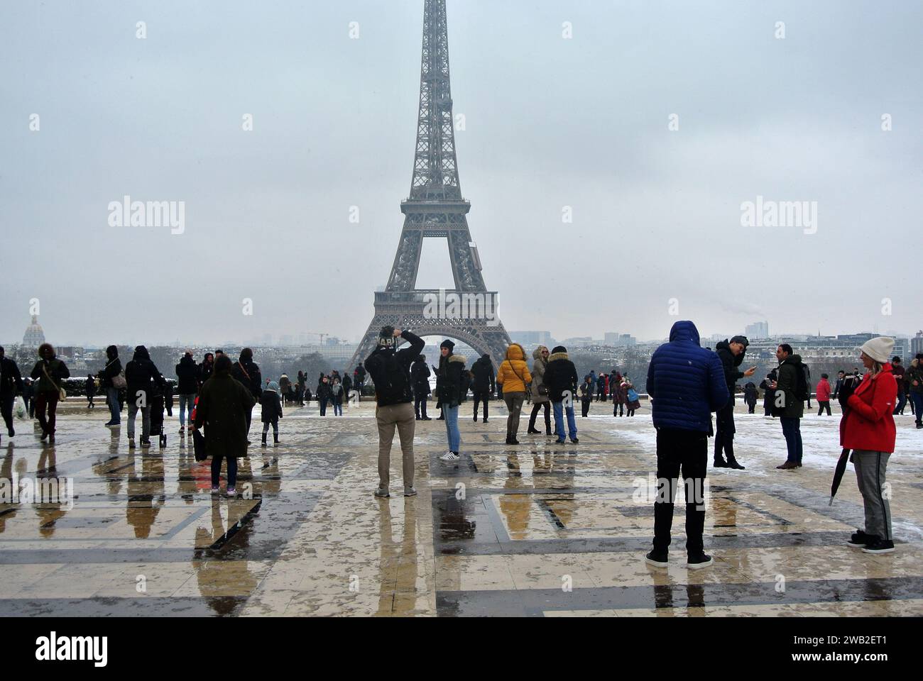 Unexpected snow in Paris. At Trocadéro Square, many tourists take ...