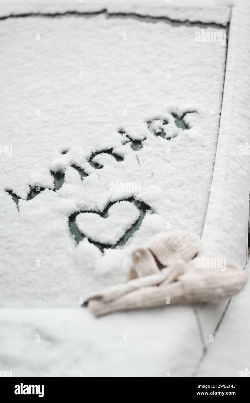 Heart written snow hi-res stock photography and images - Alamy