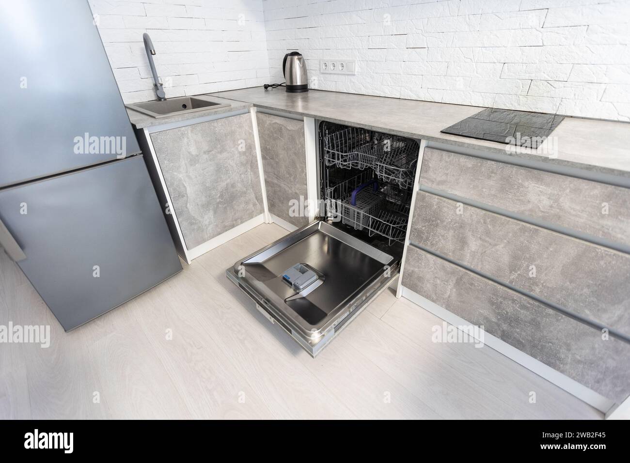 Spacious luxury well designed modern grey, beige and white kitchen with ...