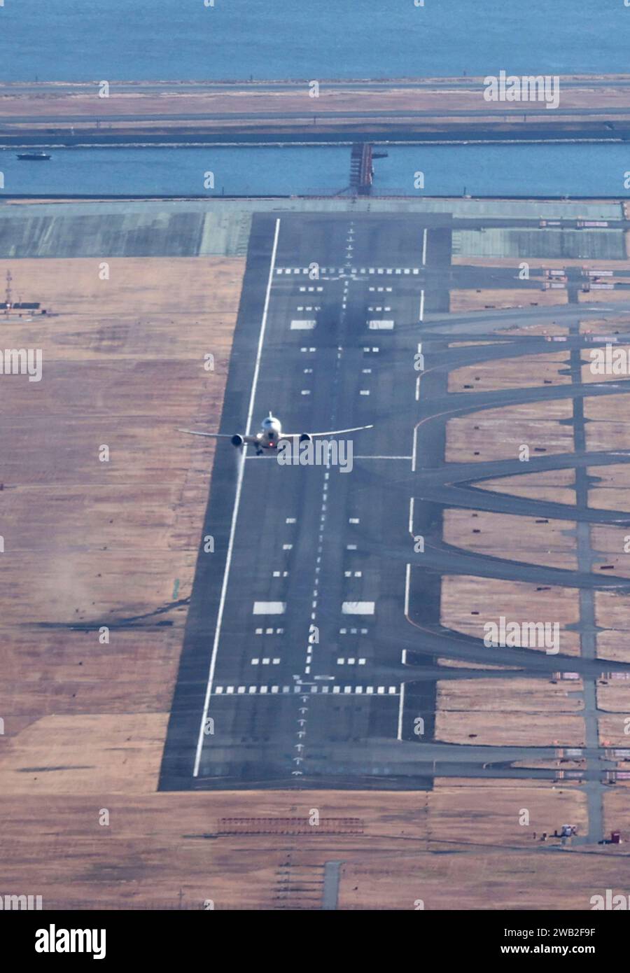 Runway C at Haneda Airport reopens in Tokyo on January 8, 2024. A Japan ...