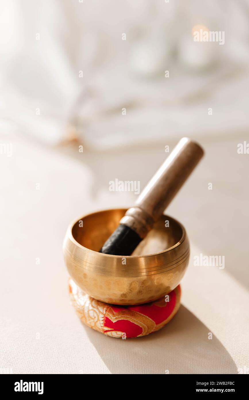 Wellness Tibetan Sound Bowl in White Space Stock Photo - Alamy
