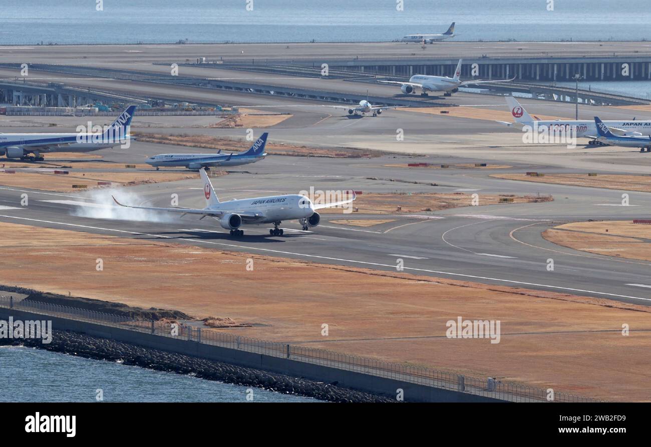 Runway C at Haneda Airport reopens in Tokyo on January 8, 2024. A Japan ...