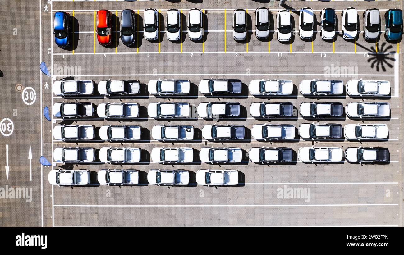 Aerial view of a parking lot at a car manufacturing facility with newly ...