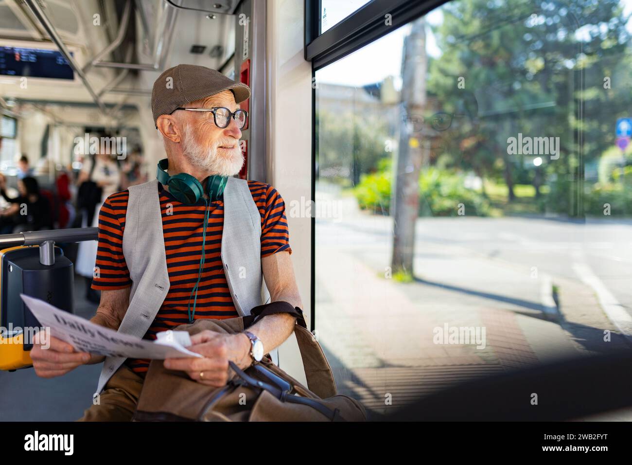 Bus reading newspaper hi-res stock photography and images - Alamy
