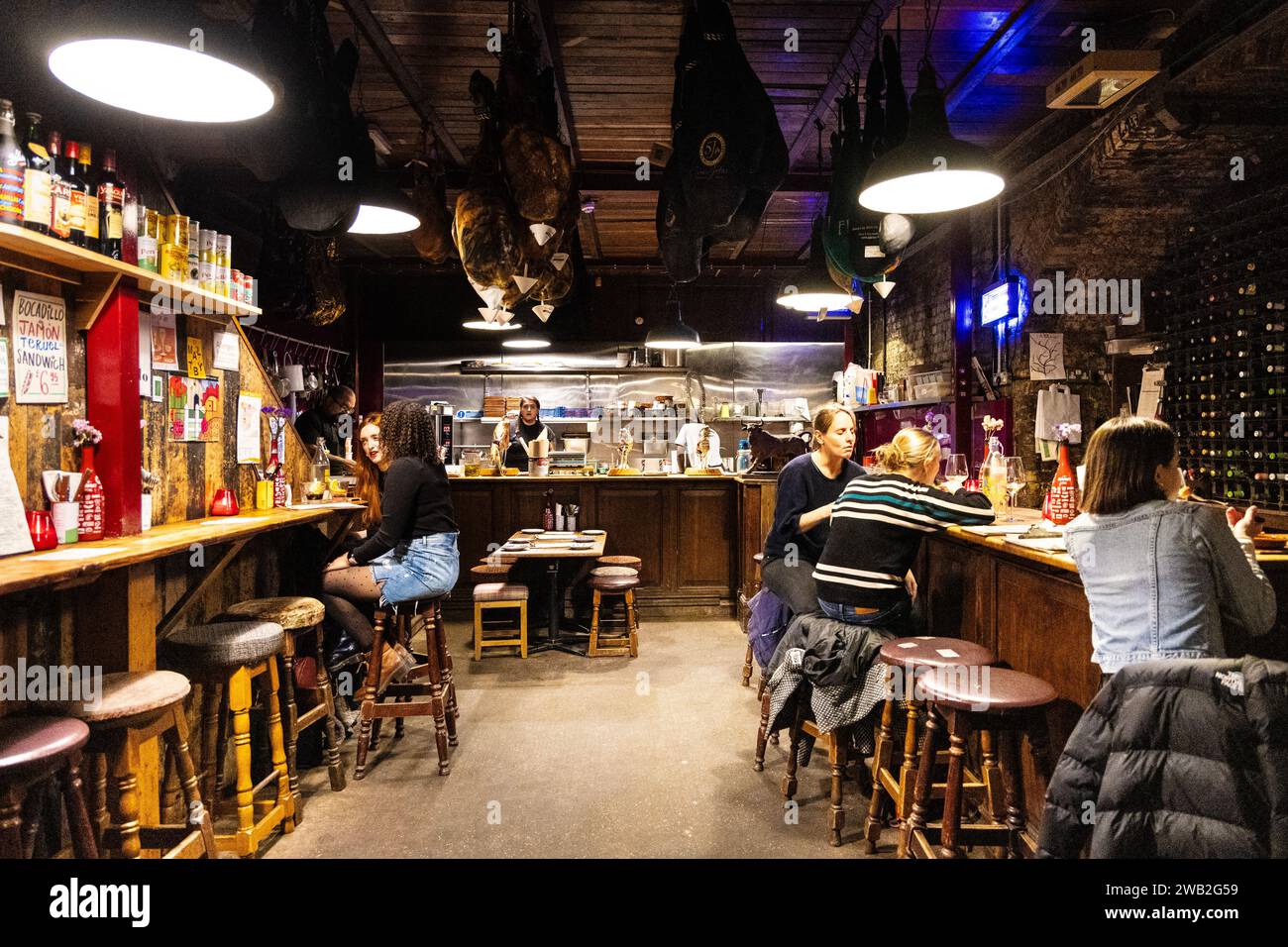 Eclectic interior of Bar Tozino tapas bar in the railway arches of ...