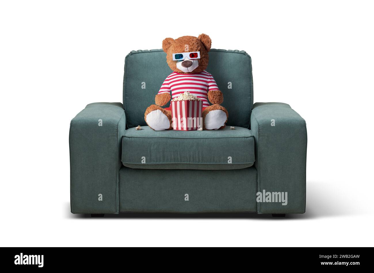 Teddy bear sitting on the couch and watching 3D movies at home Stock ...