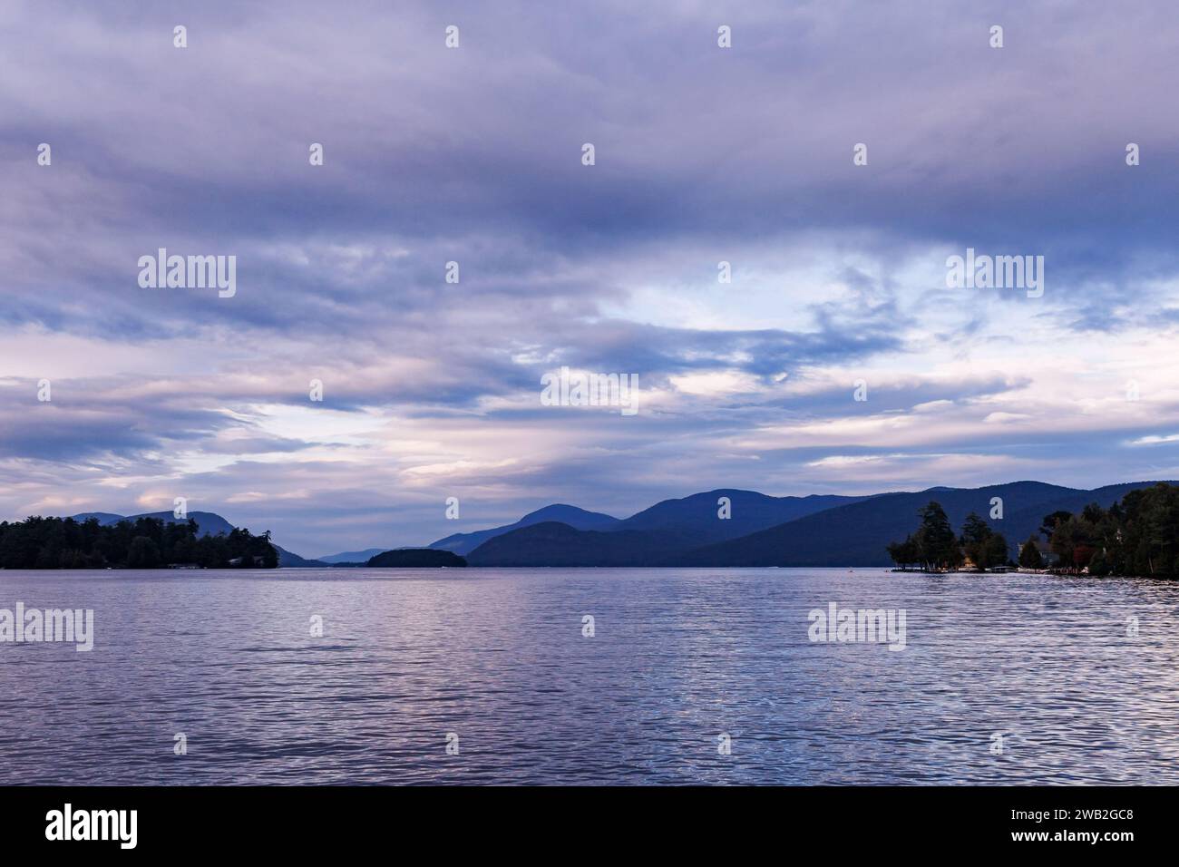 View of mountain range over lake Stock Photo - Alamy