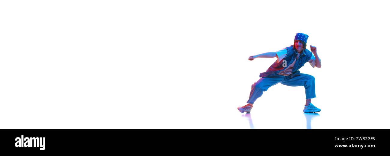 Young girl, hip hop dancer in motion, dancing isolated over white ...