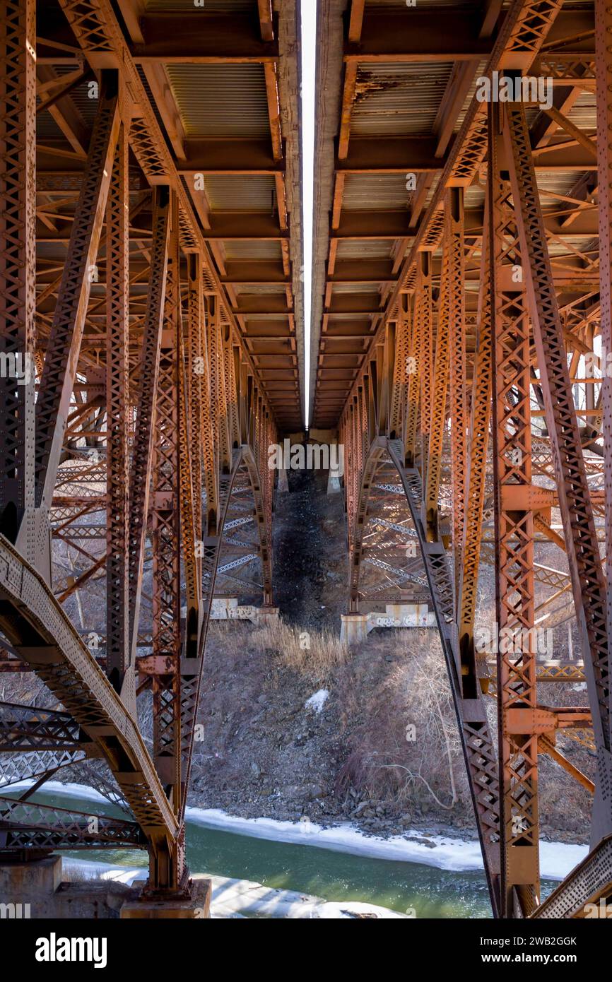 Geometric view of trestles under overpass Stock Photo - Alamy