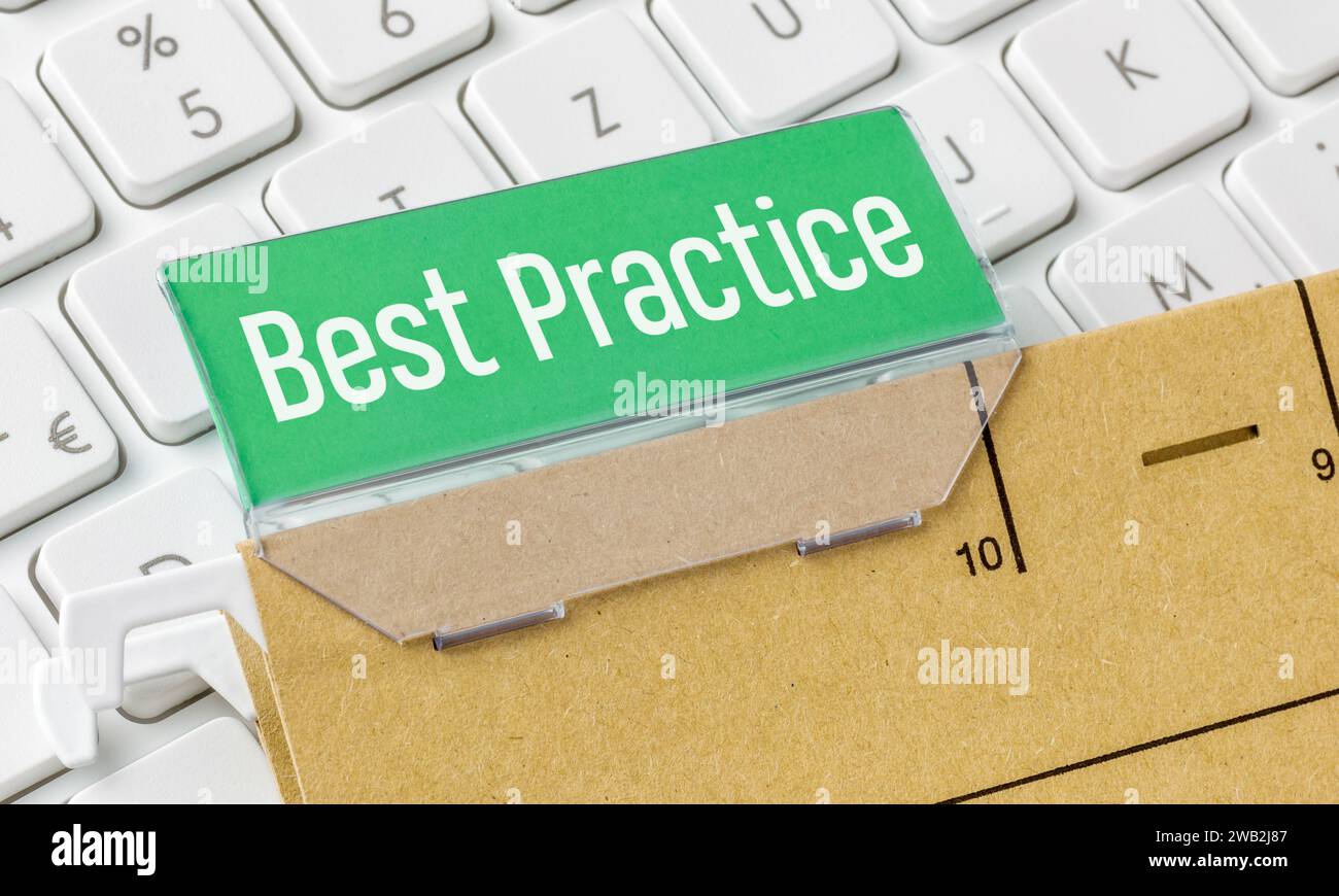 A brown file folder labeled Best Practice Stock Photo - Alamy