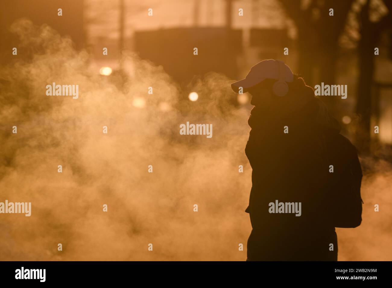 RIGA, Latvia. 8th Jan, 2024. Selective focus photo. Person walks on ...