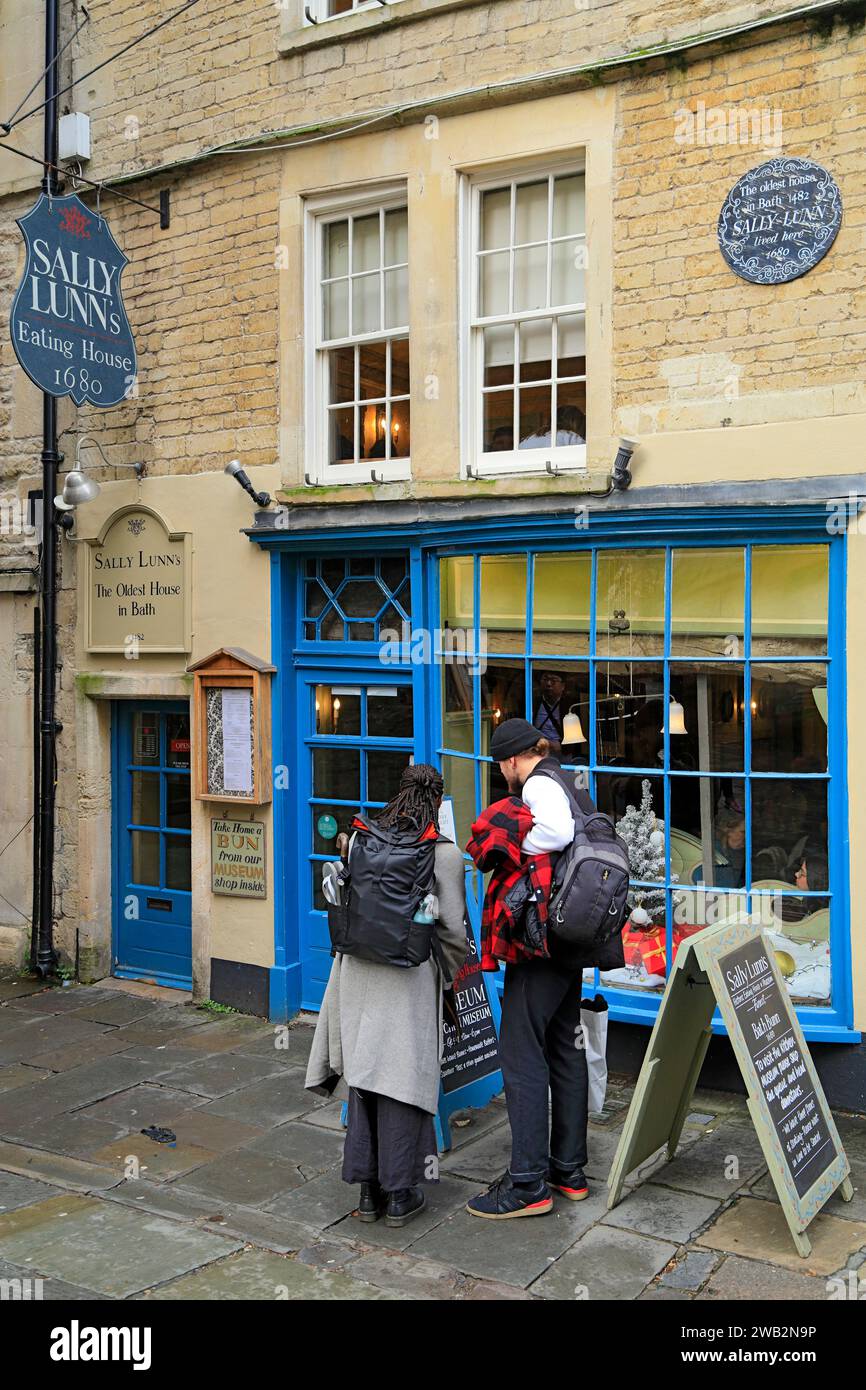 Couple looking at menu, Sally Lunn's Eating House, Bath, Somerset Stock ...