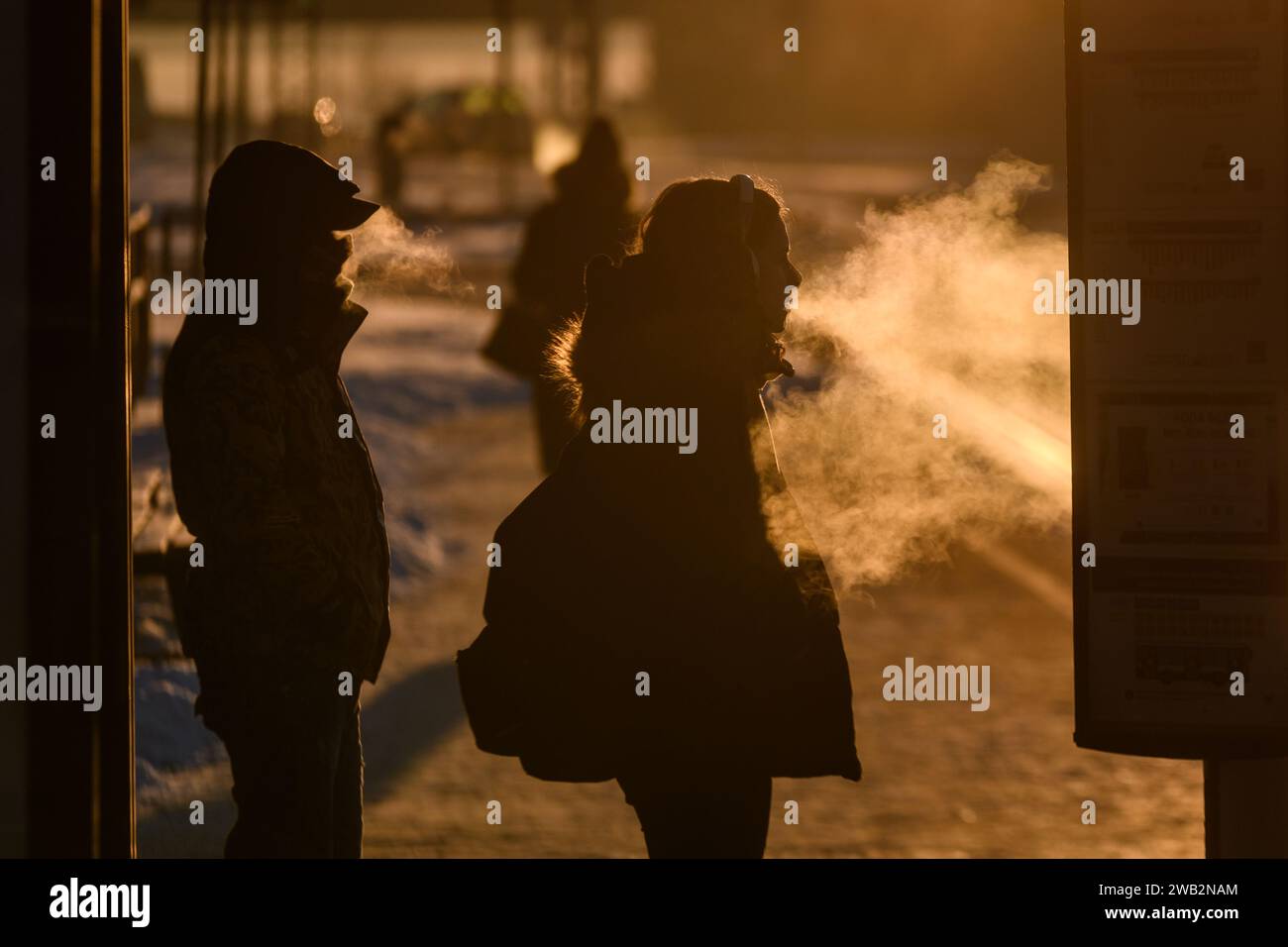 RIGA, Latvia. 8th Jan, 2024. Selective focus photo. People waiting bus ...