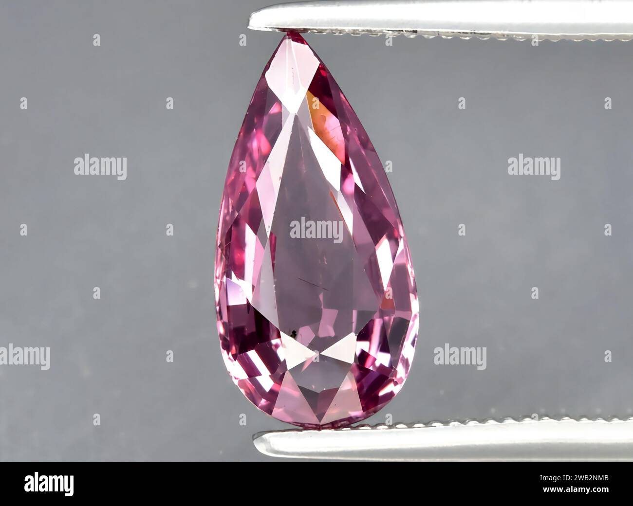 Natural pink malaya garnet gem background Stock Photo - Alamy