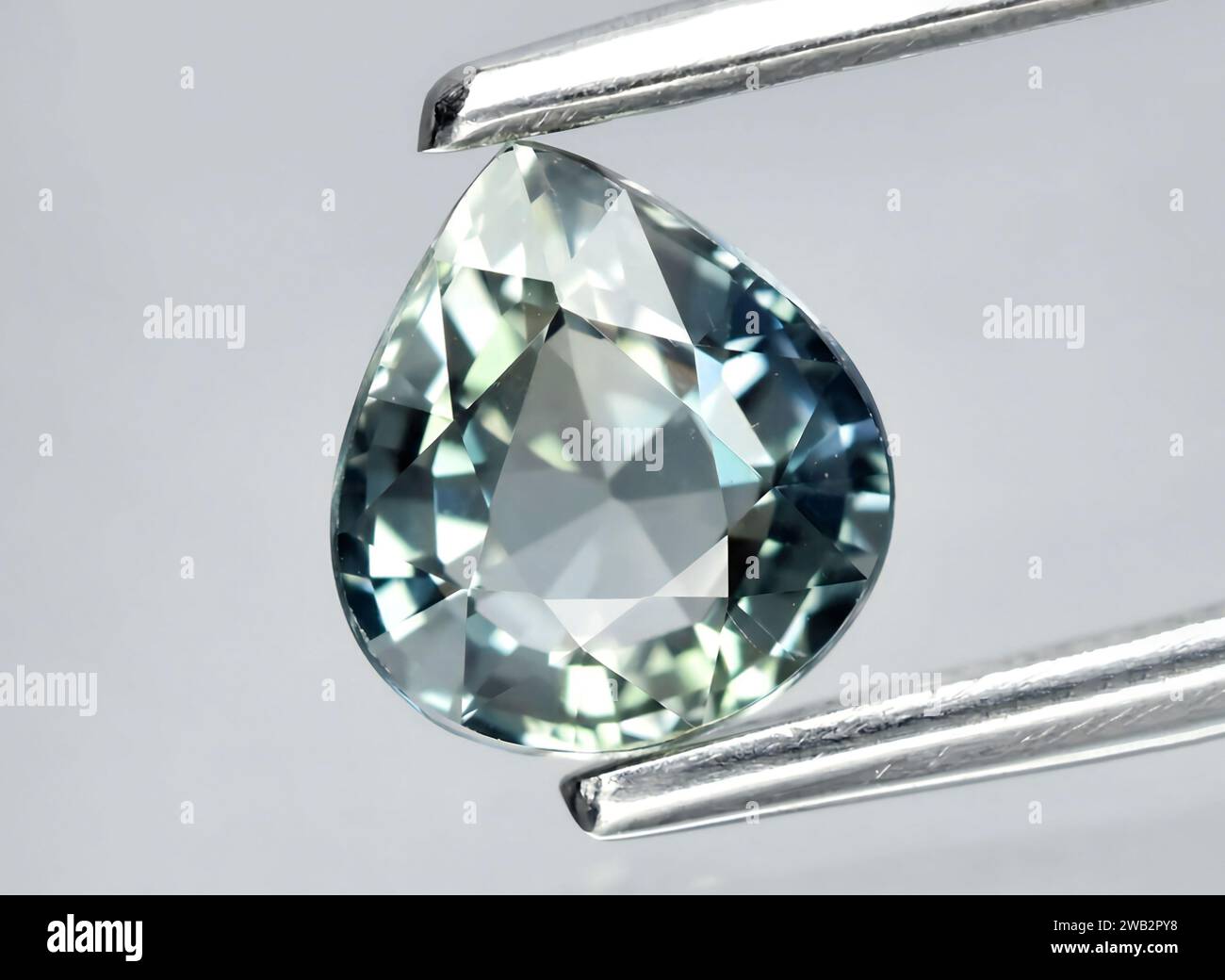 Natural light blue sapphire gem on background Stock Photo - Alamy