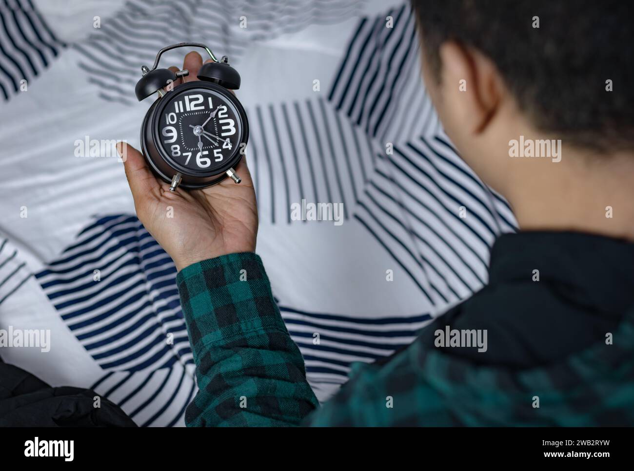 Man set alarm clock hi-res stock photography and images - Alamy