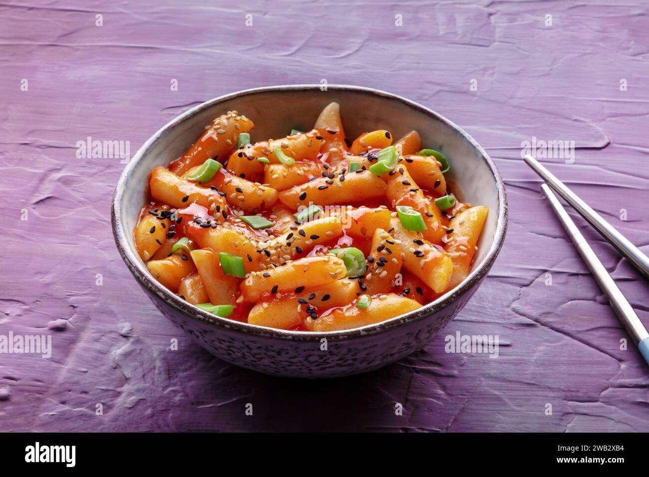 Tteokbokki or topokki, Korean street food, spicy rice cakes in red ...