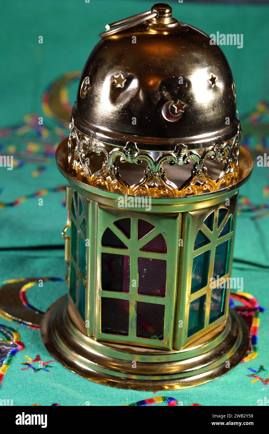 Ramadan Lantern lamp or Fanous Ramadan on a green background as a ...