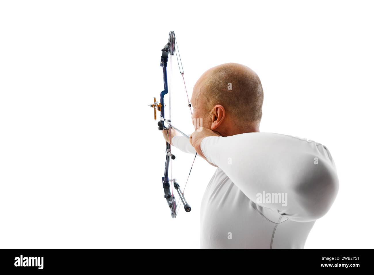 Back view image of man, archery at hele aiming with archery bow on ...