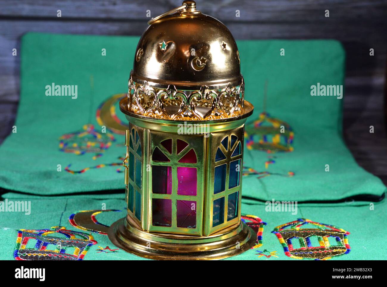 Ramadan Lantern lamp or Fanous Ramadan on a green background as a ...