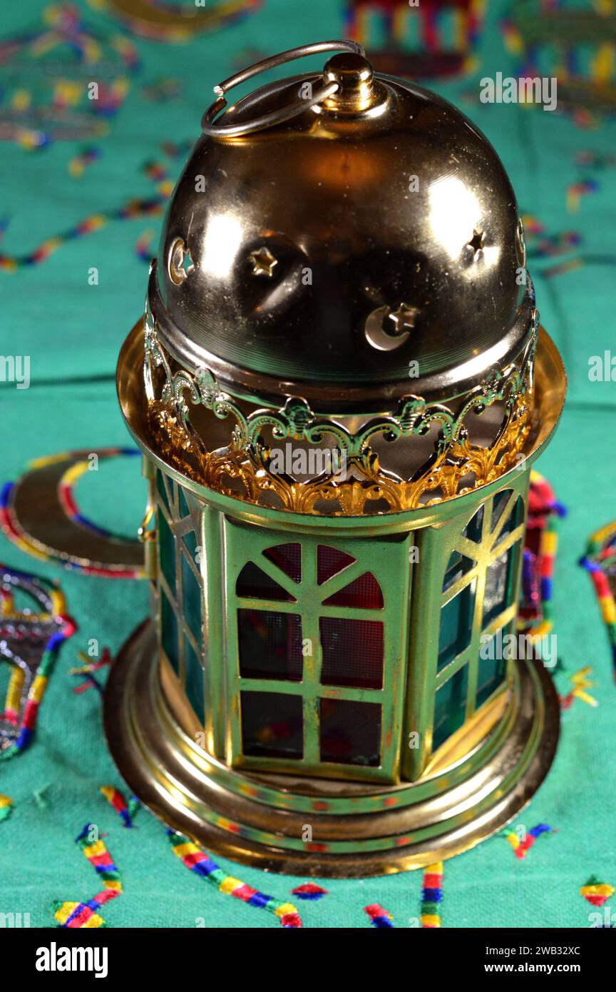 Ramadan Lantern lamp or Fanous Ramadan on a green background as a ...