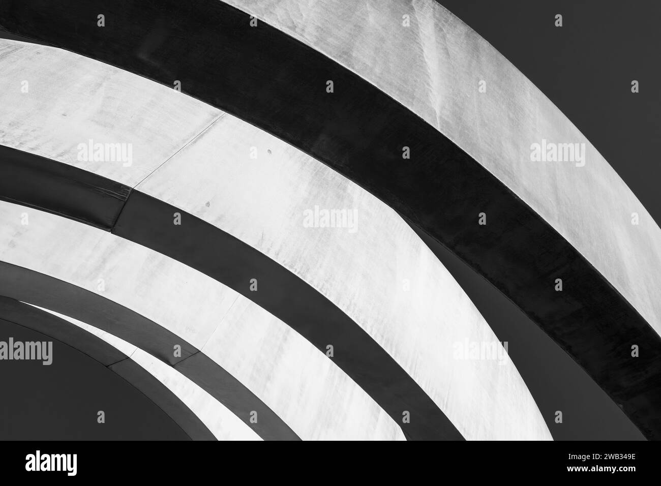 Striking monochrome architectural feature with sweeping curves and a ...