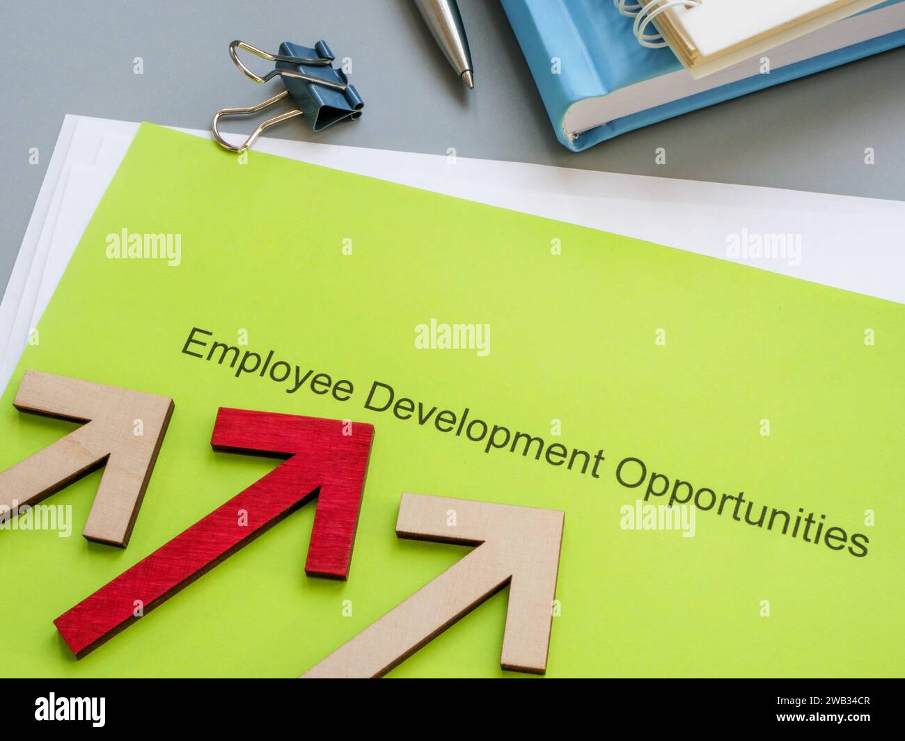 Employee development opportunities documents and arrows Stock Photo - Alamy