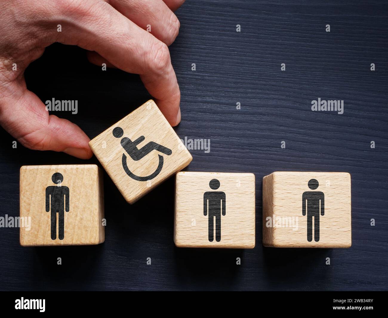 Supported Employment and inclusion. Cubes with employees and hand ...