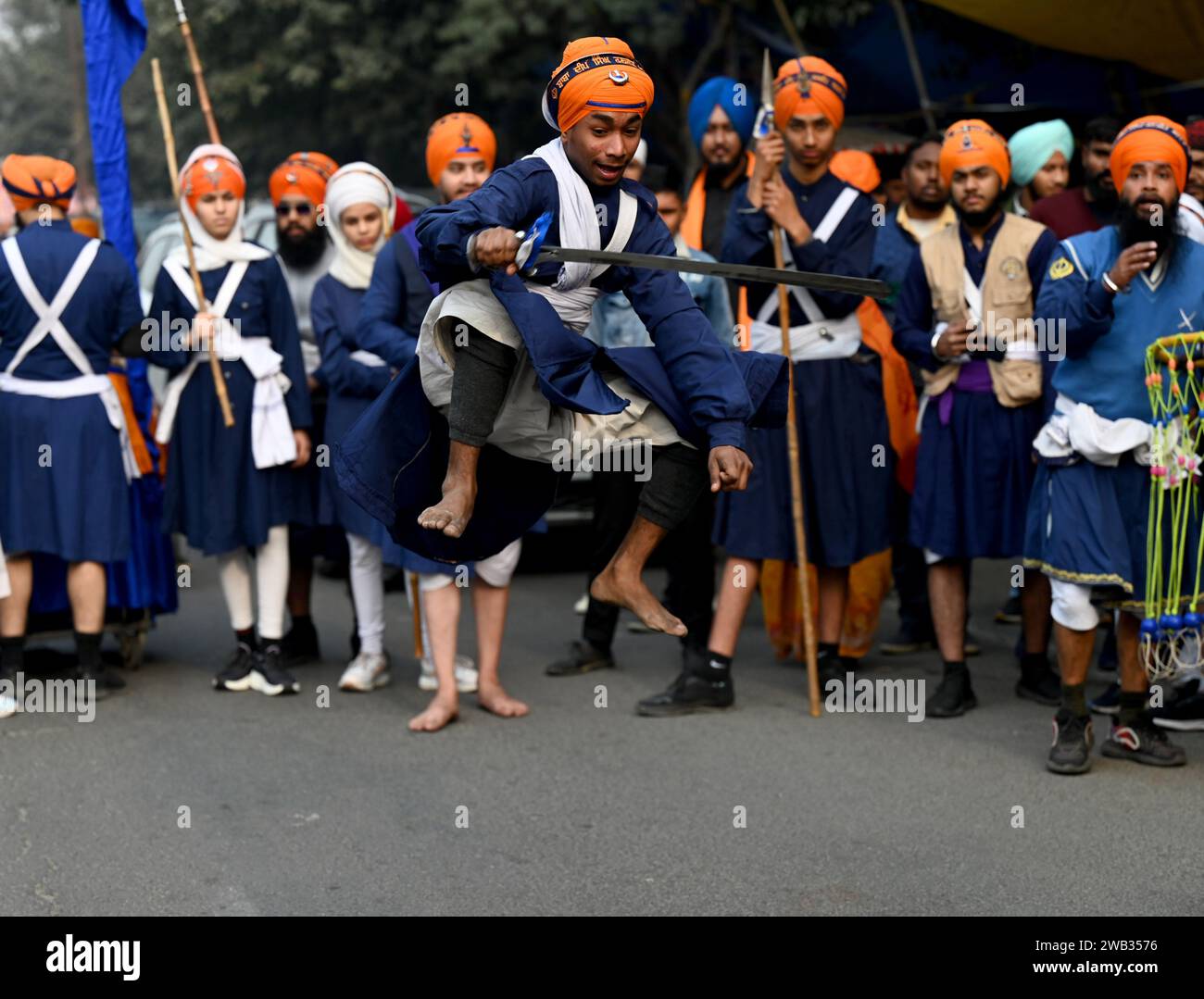 NOIDA, INDIA – JANUARY 7: Sikh devotees demonstrate Gatka martial arts skills during 'Nagar ...