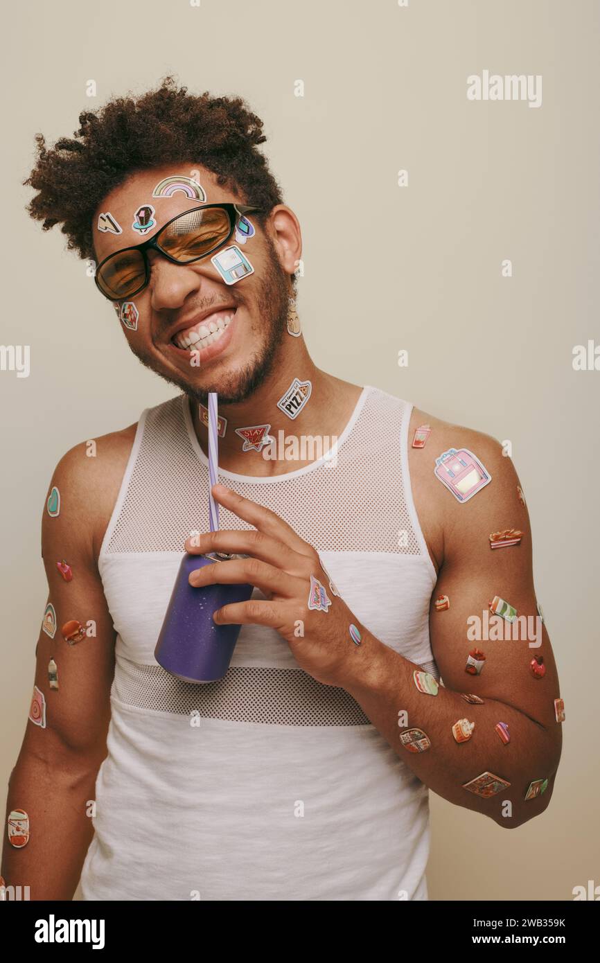Black man holding can hi-res stock photography and images - Alamy