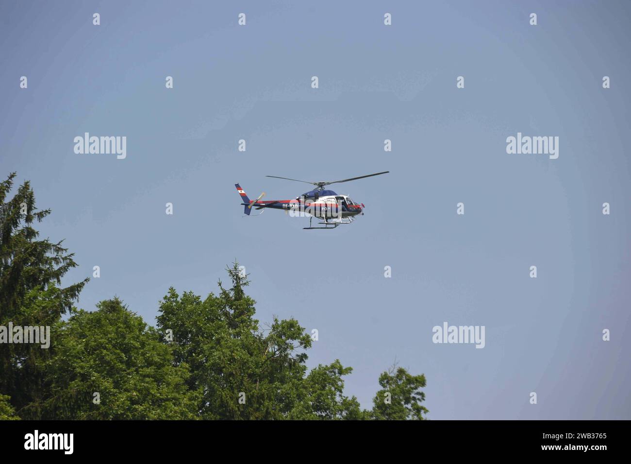 a police helicopter in the air, mobility and transportation in aviation ...