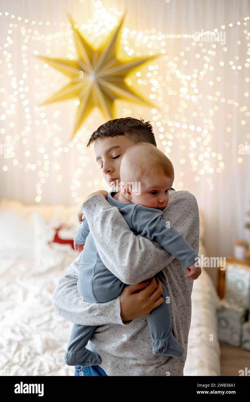 Adorable baby older brother hi-res stock photography and images - Alamy