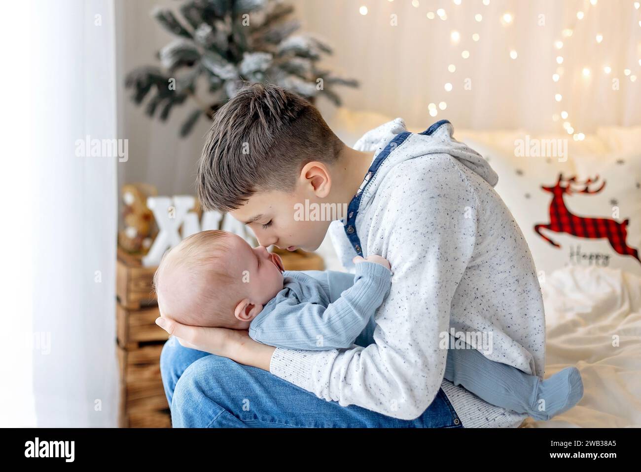 Adorable baby older brother hi-res stock photography and images - Alamy